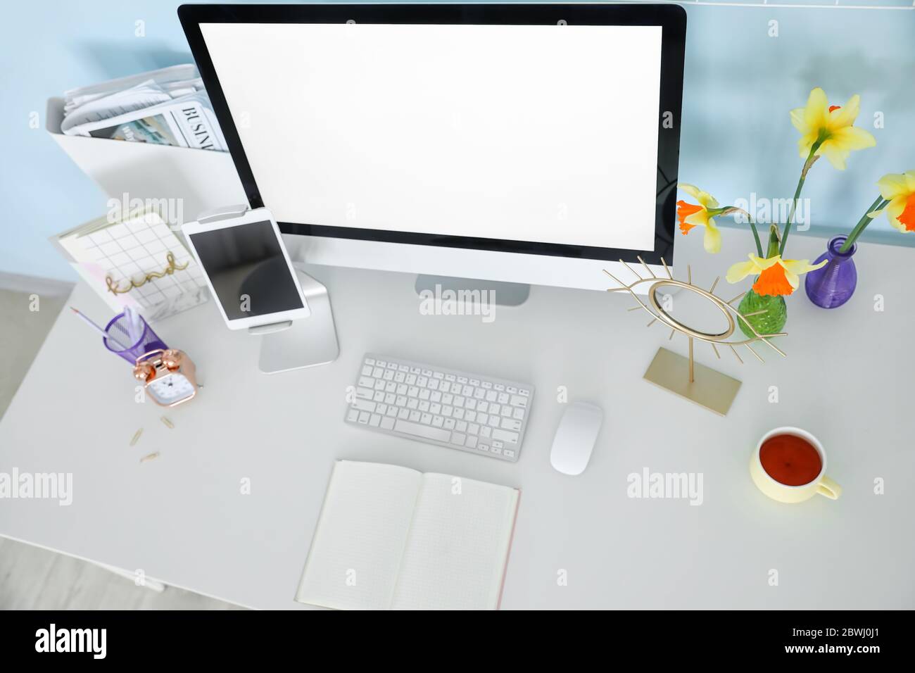 Modern workplace with computer in room Stock Photo - Alamy