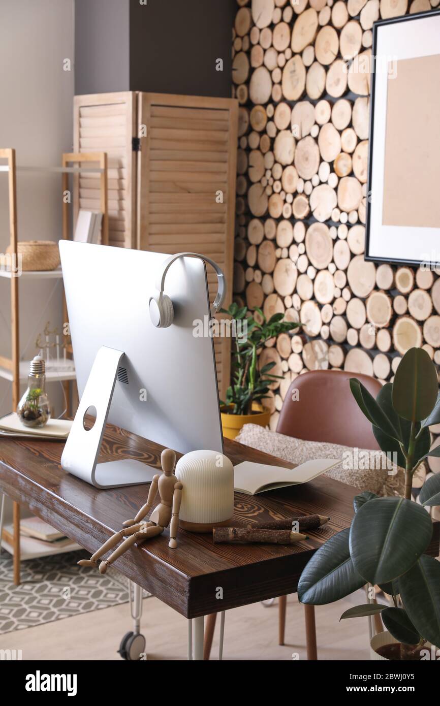 Stylish workplace with modern computer in interior of room Stock Photo ...