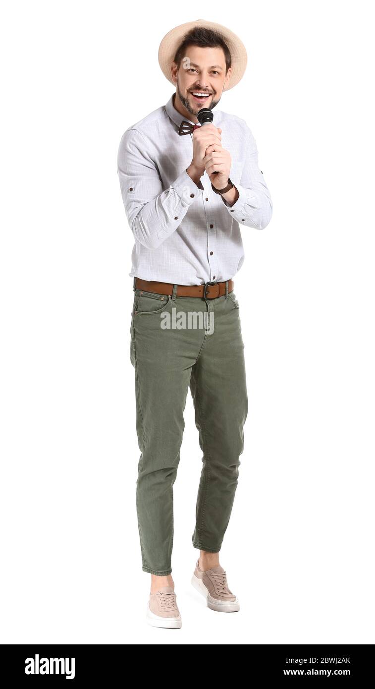 Handsome man singing against white background Stock Photo - Alamy