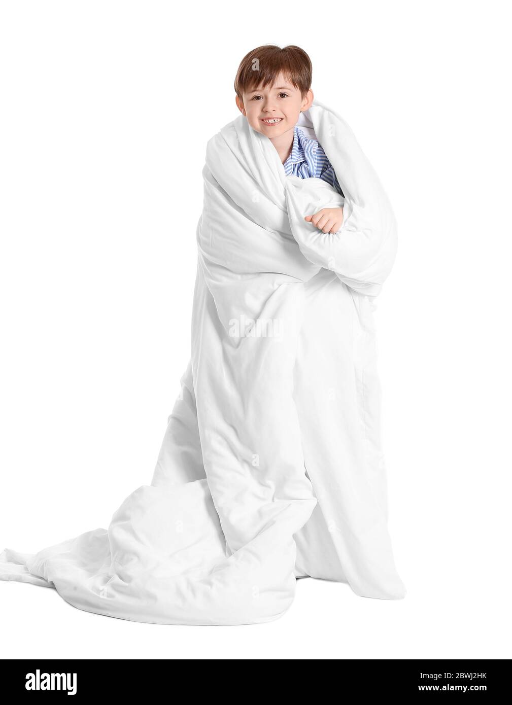 Little boy wrapped in blanket on white background Stock Photo - Alamy