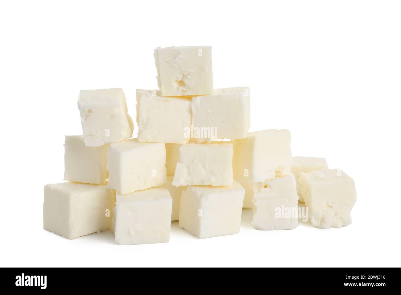 Tasty cut feta cheese on white background Stock Photo - Alamy