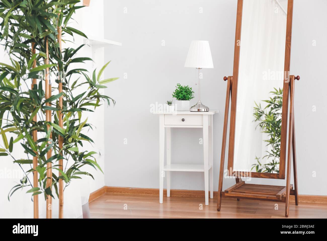 Interior of room with big mirror Stock Photo - Alamy