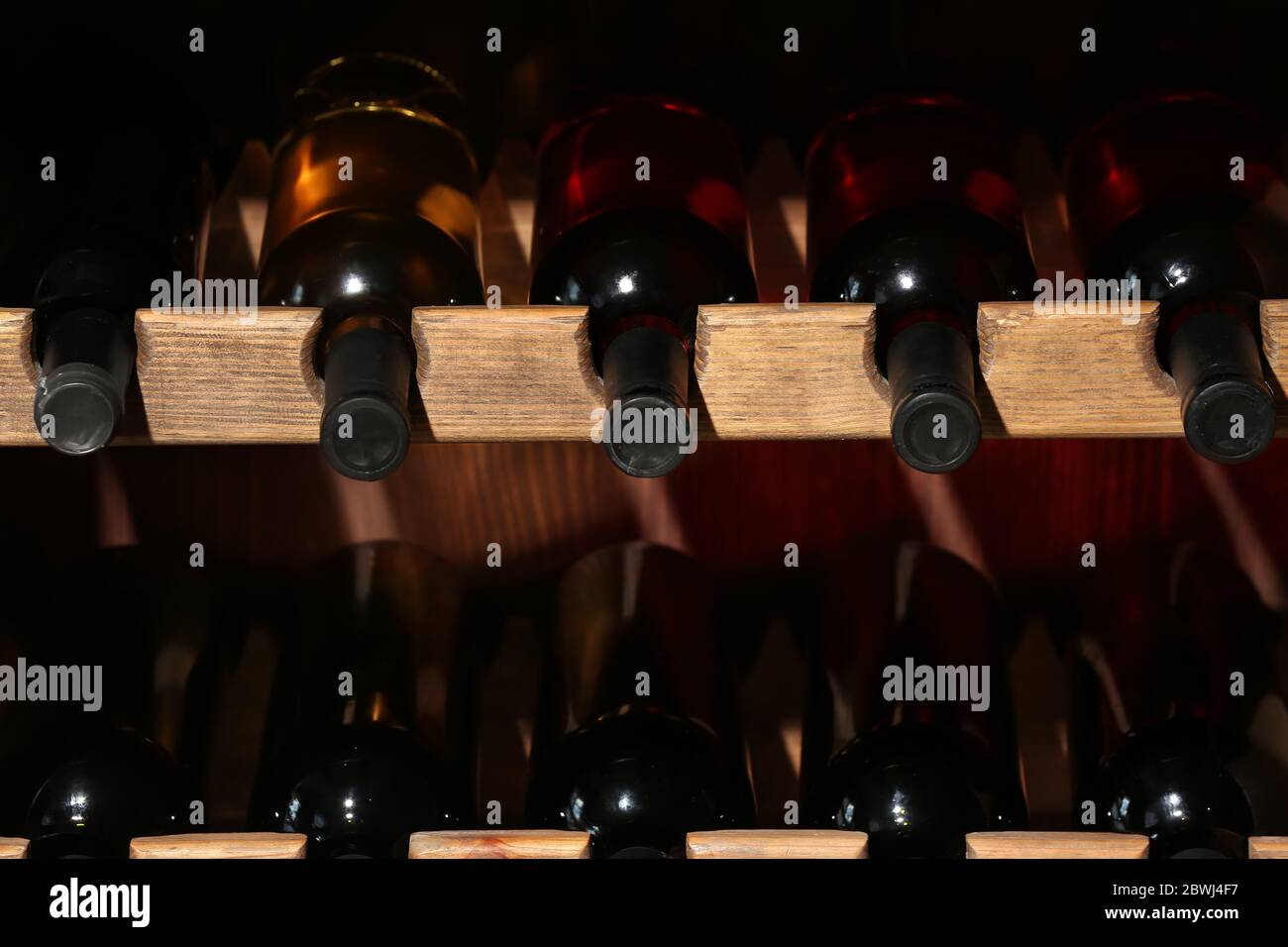 Bottles of wine in cellar Stock Photo - Alamy