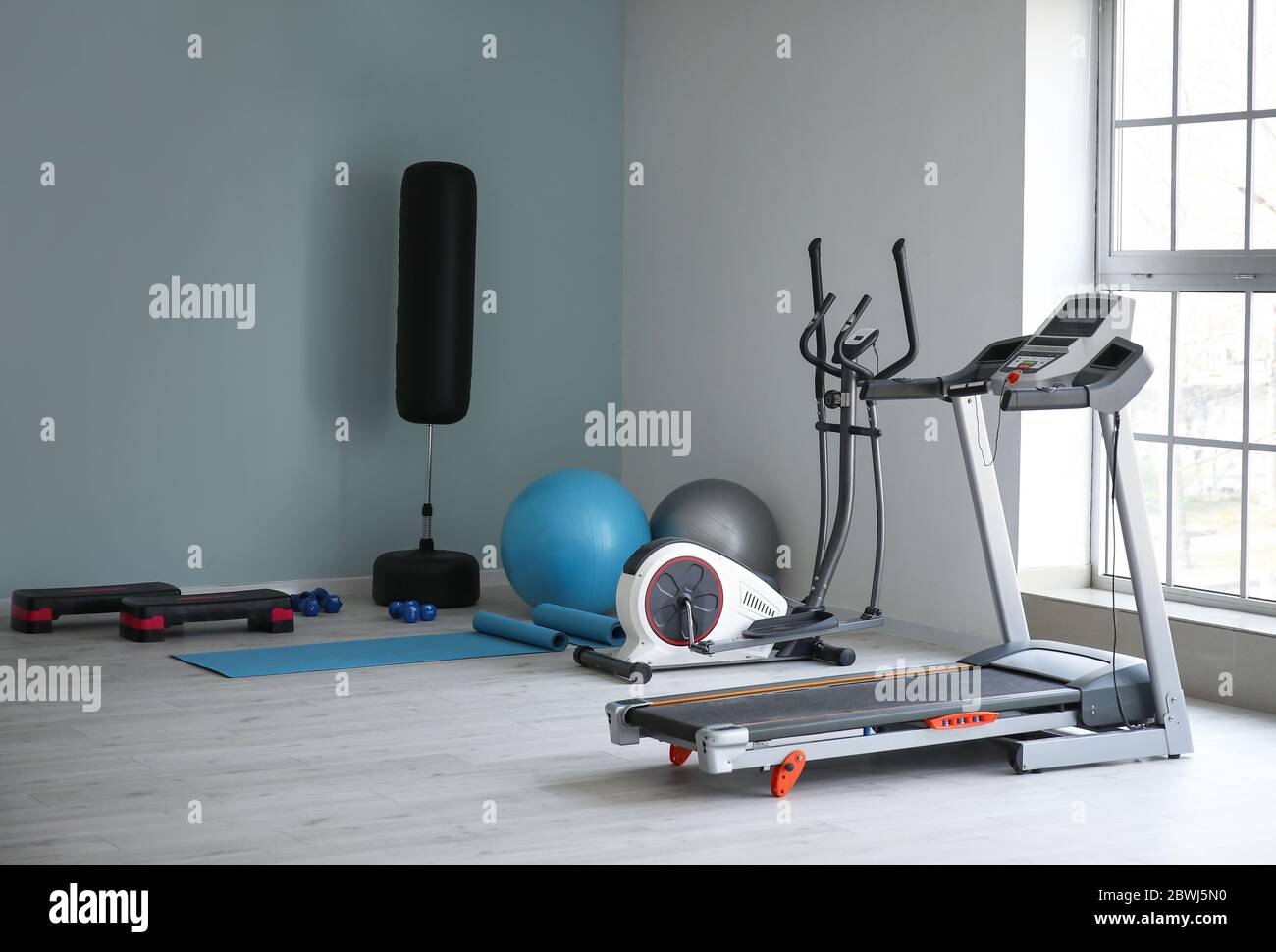 Interior of gym with modern equipment Stock Photo - Alamy