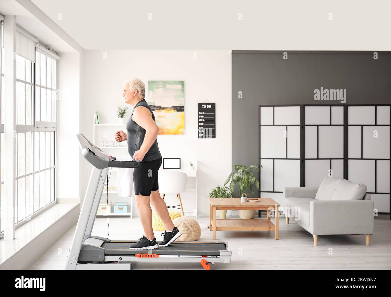 Elderly person on treadmill hi-res stock photography and images - Alamy