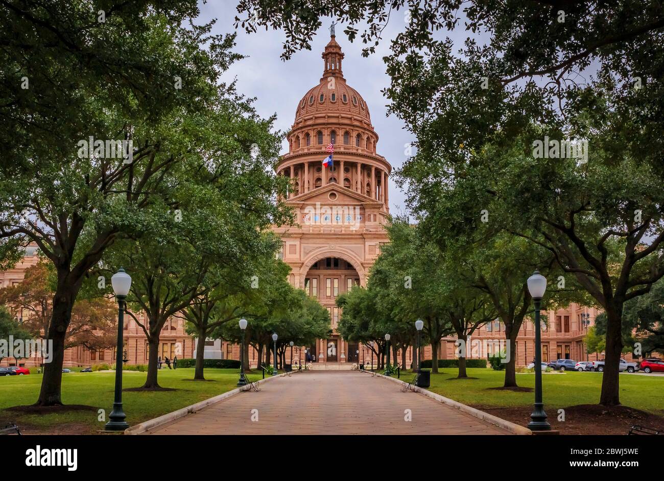 Tree lined path leading to Texas State Capitol Building in Austin, TX ...