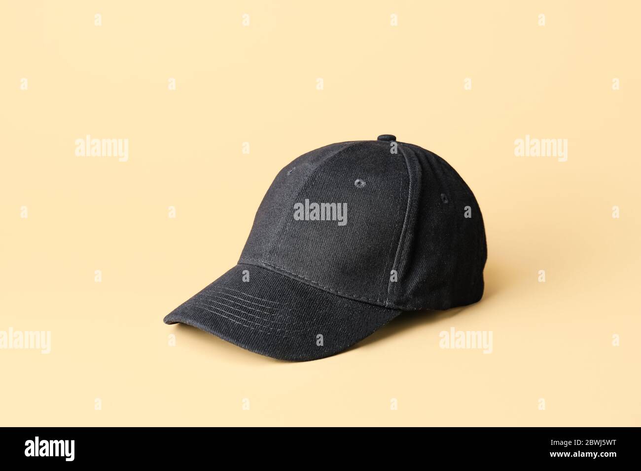 Blank cap on color background Stock Photo - Alamy
