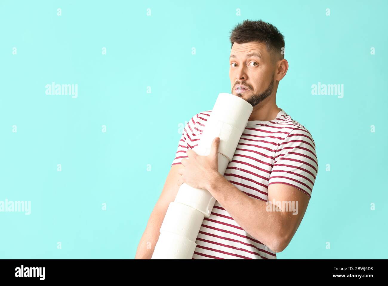 Confused man toilet paper hi-res stock photography and images - Alamy