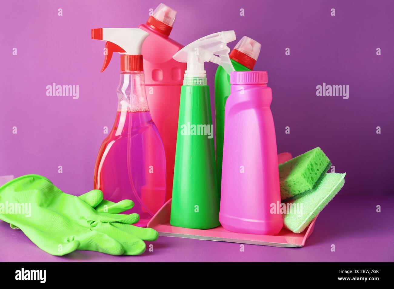 Set of cleaning supplies on color background Stock Photo - Alamy