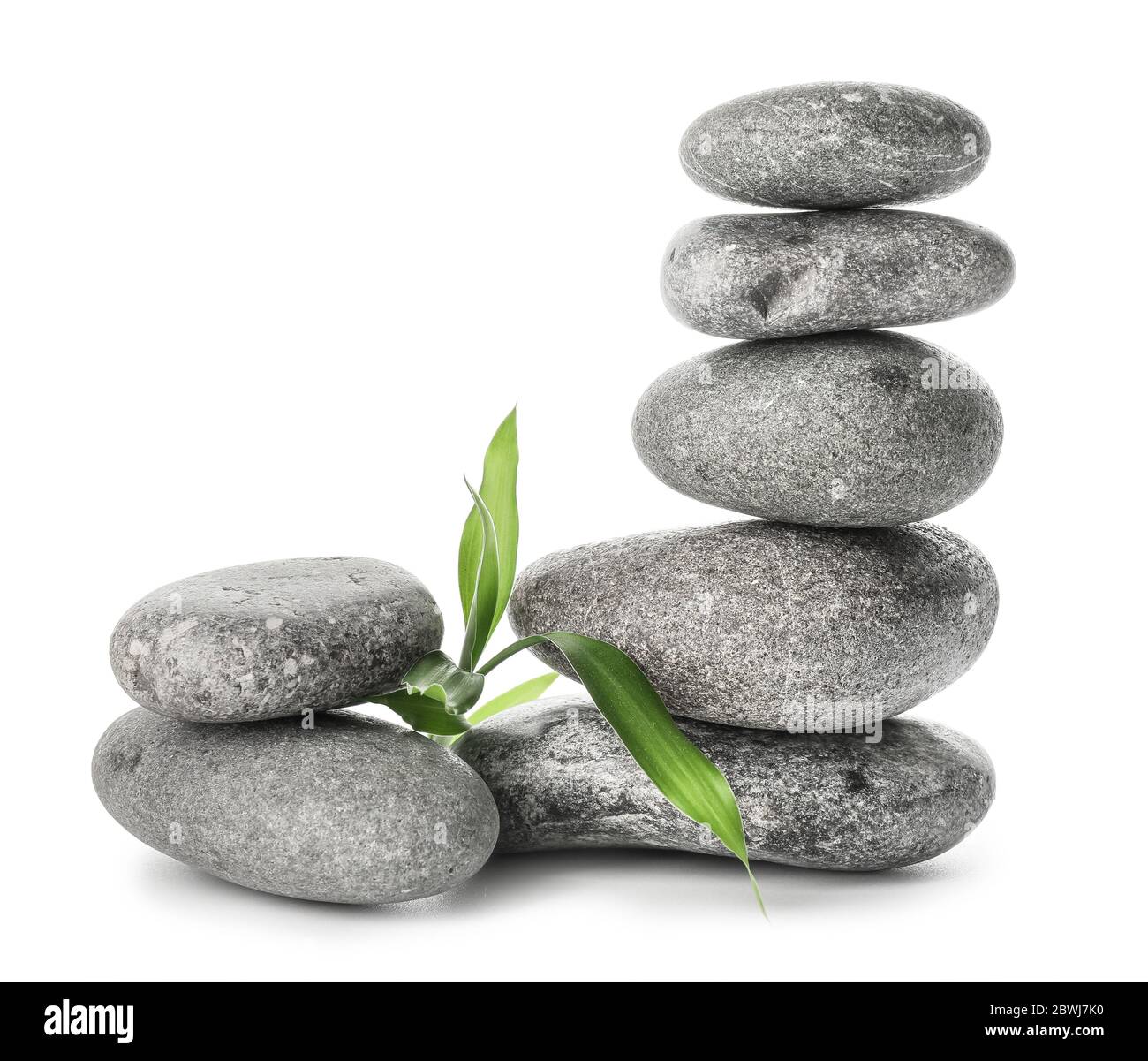 Spa stones on white background Stock Photo - Alamy