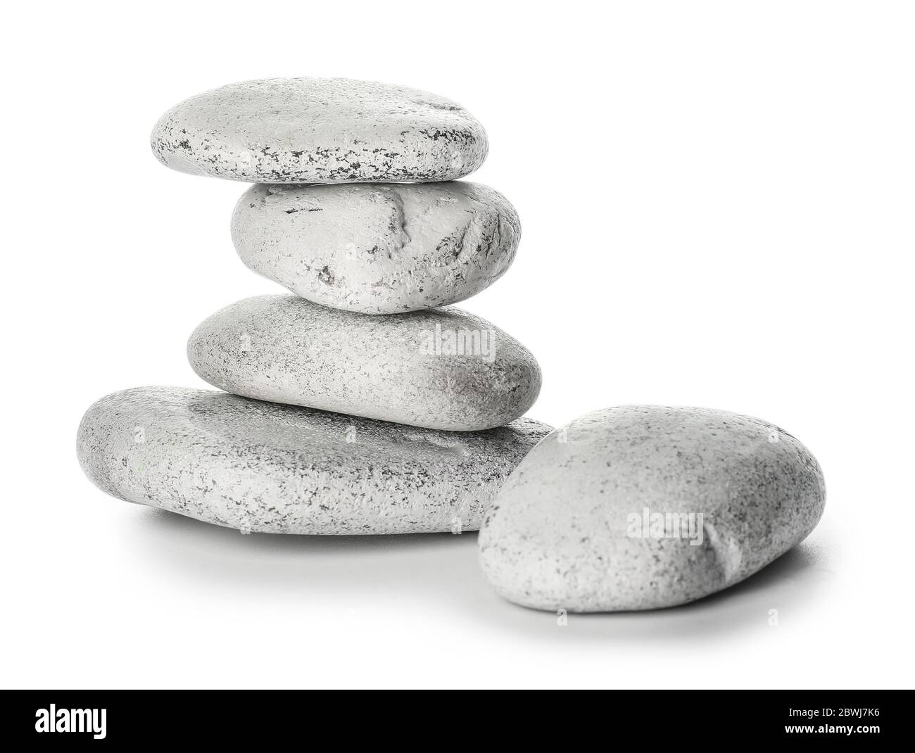 Spa stones on white background Stock Photo - Alamy