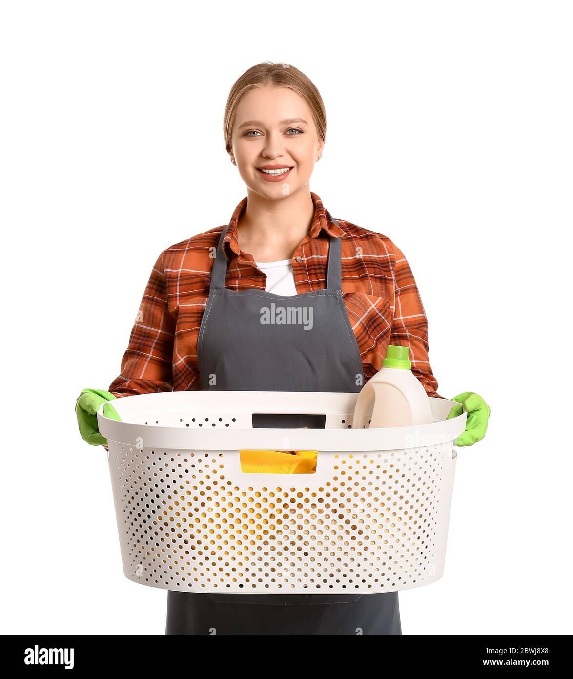 Young woman with laundry on white background Stock Photo - Alamy