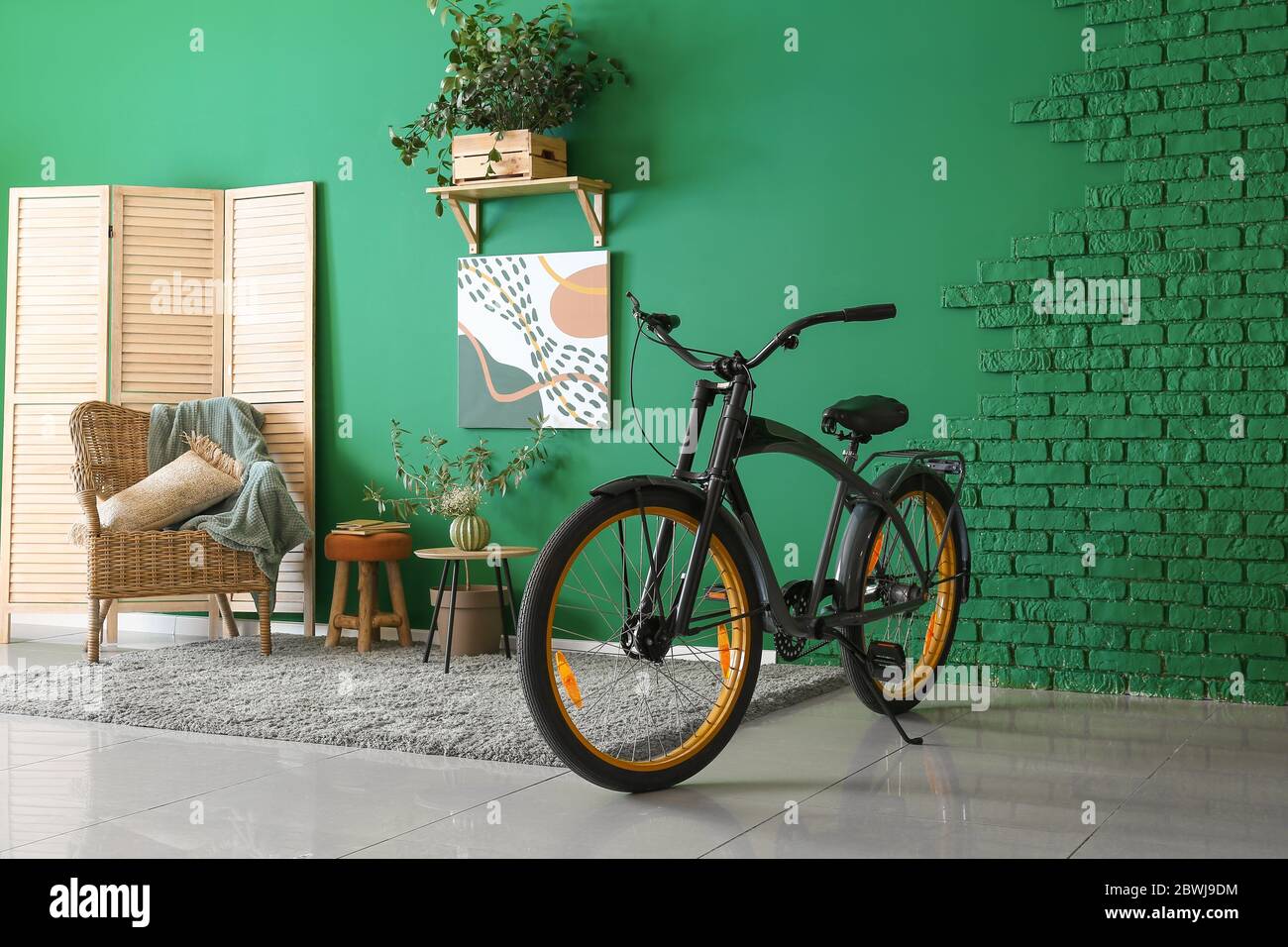 Interior of modern room with stylish bicycle Stock Photo - Alamy