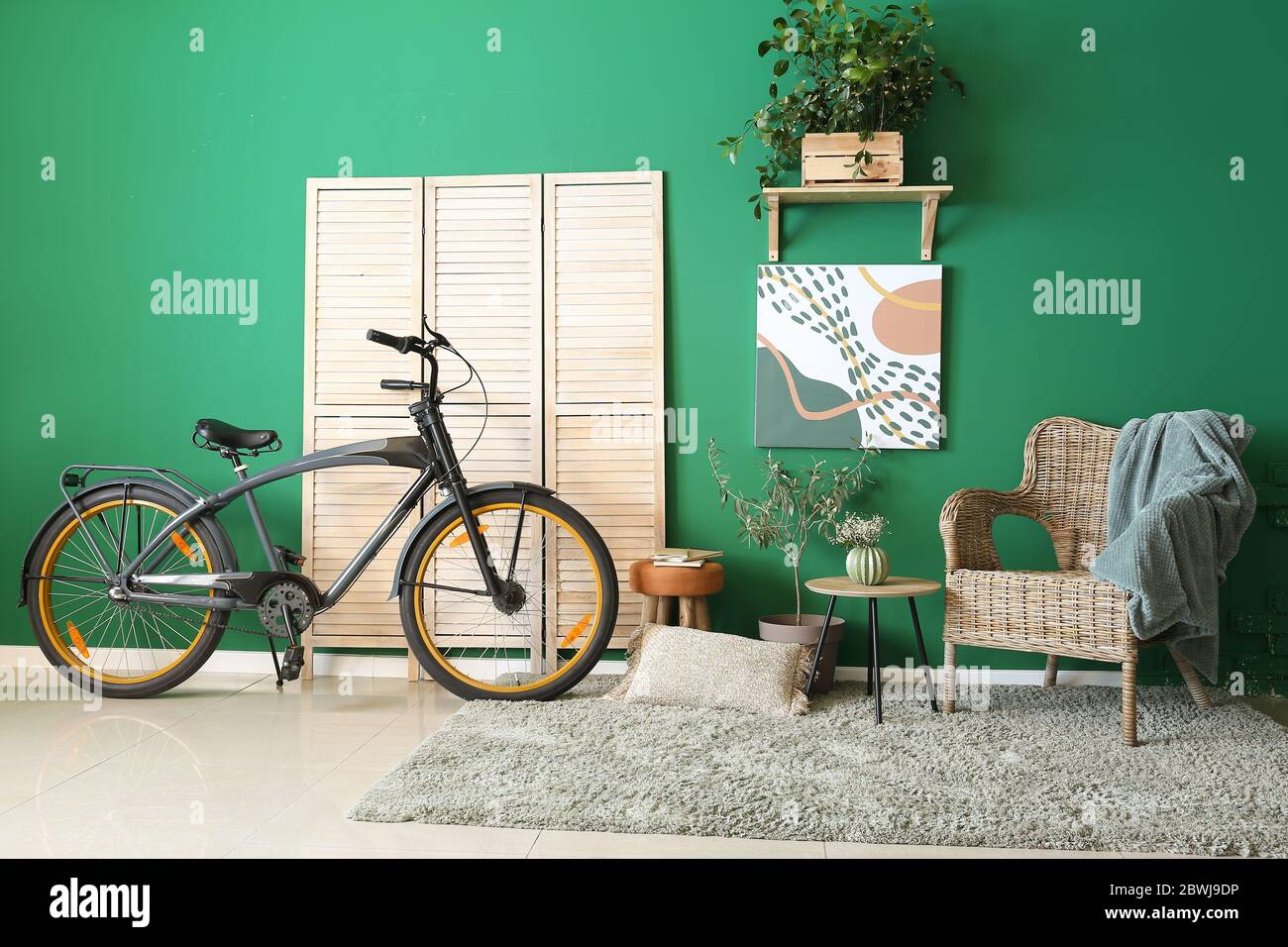 Interior of modern room with stylish bicycle Stock Photo - Alamy
