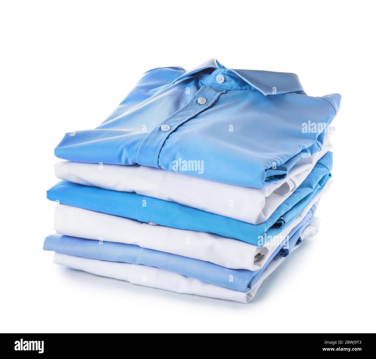 Stack of clean clothes on white background Stock Photo - Alamy