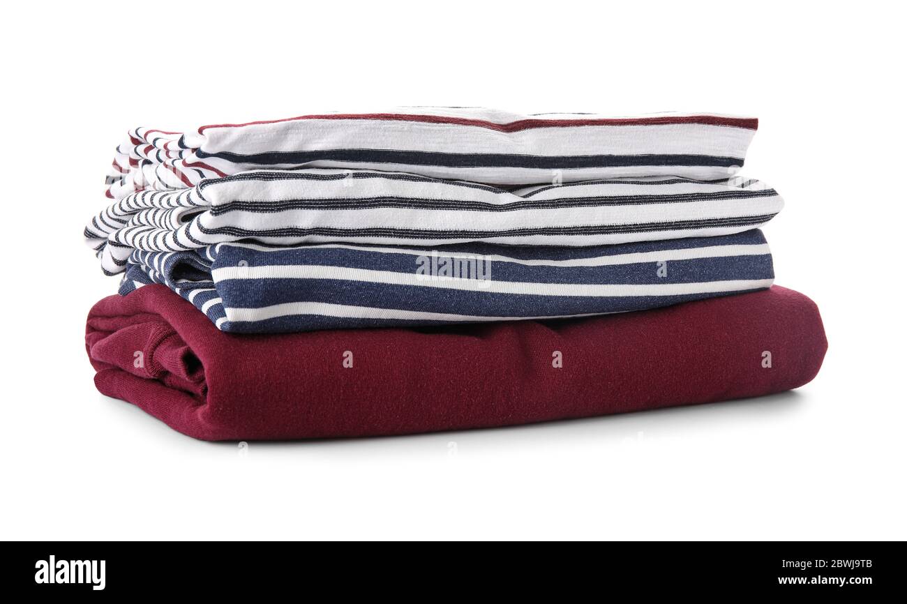 Stack of clean clothes on white background Stock Photo - Alamy