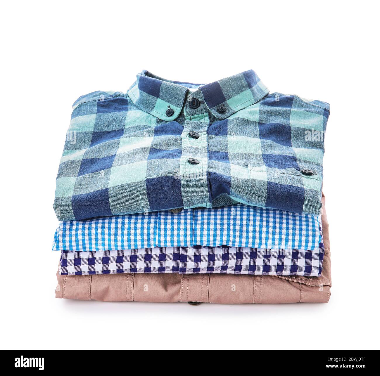 Stack of clean clothes on white background Stock Photo - Alamy