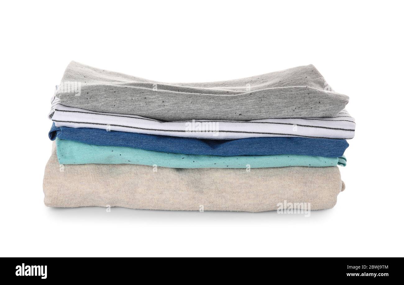 Stack of clean clothes on white background Stock Photo - Alamy