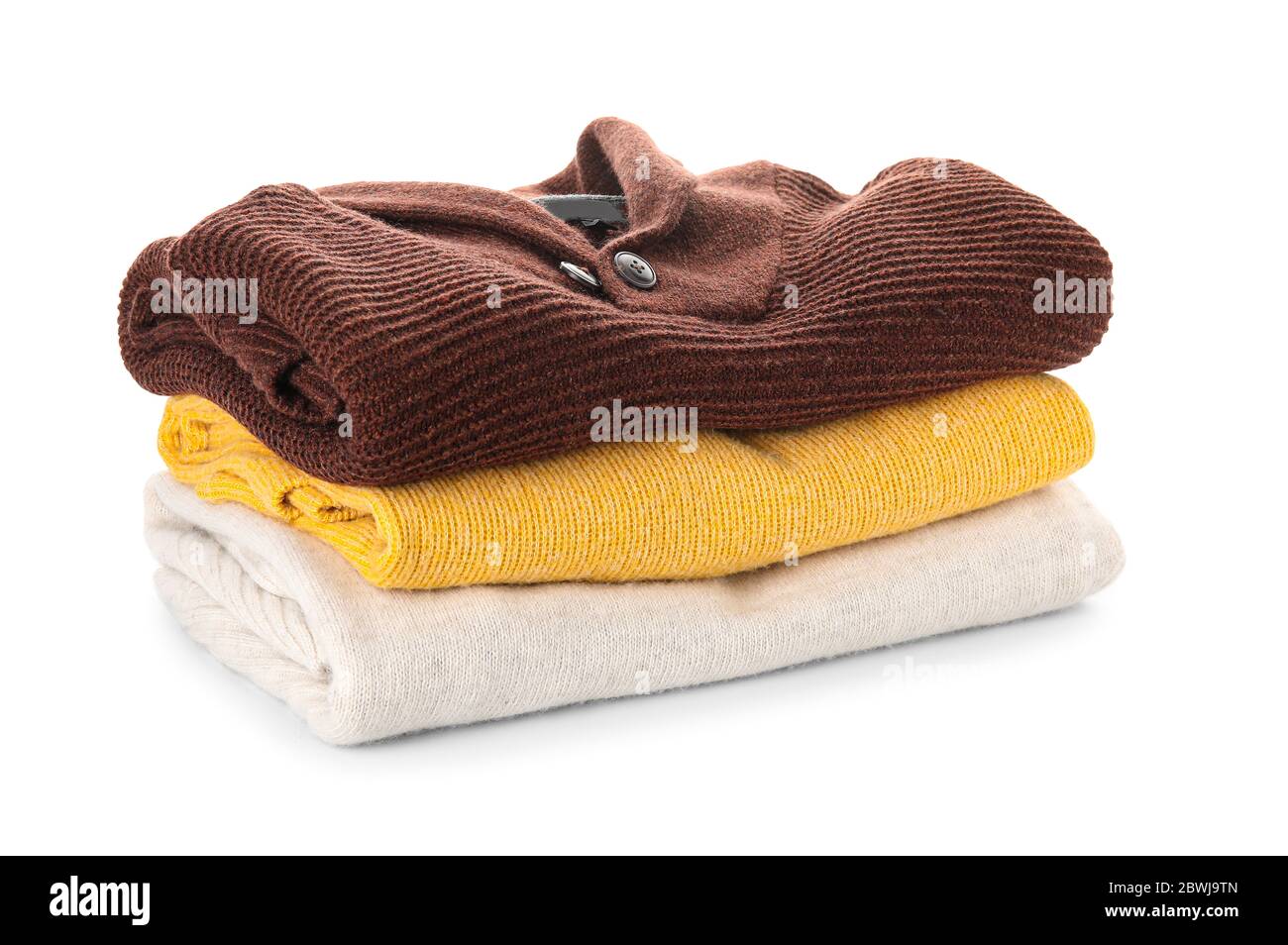 Stack of clean clothes on white background Stock Photo - Alamy