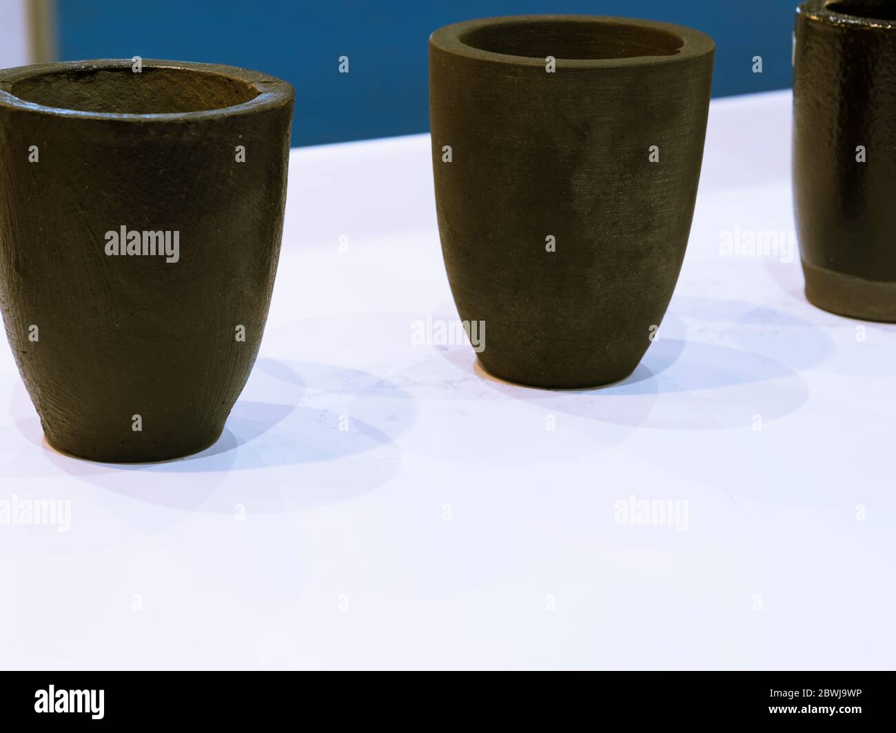 the small black ceramic crucible for transfer molten metal into mold ...