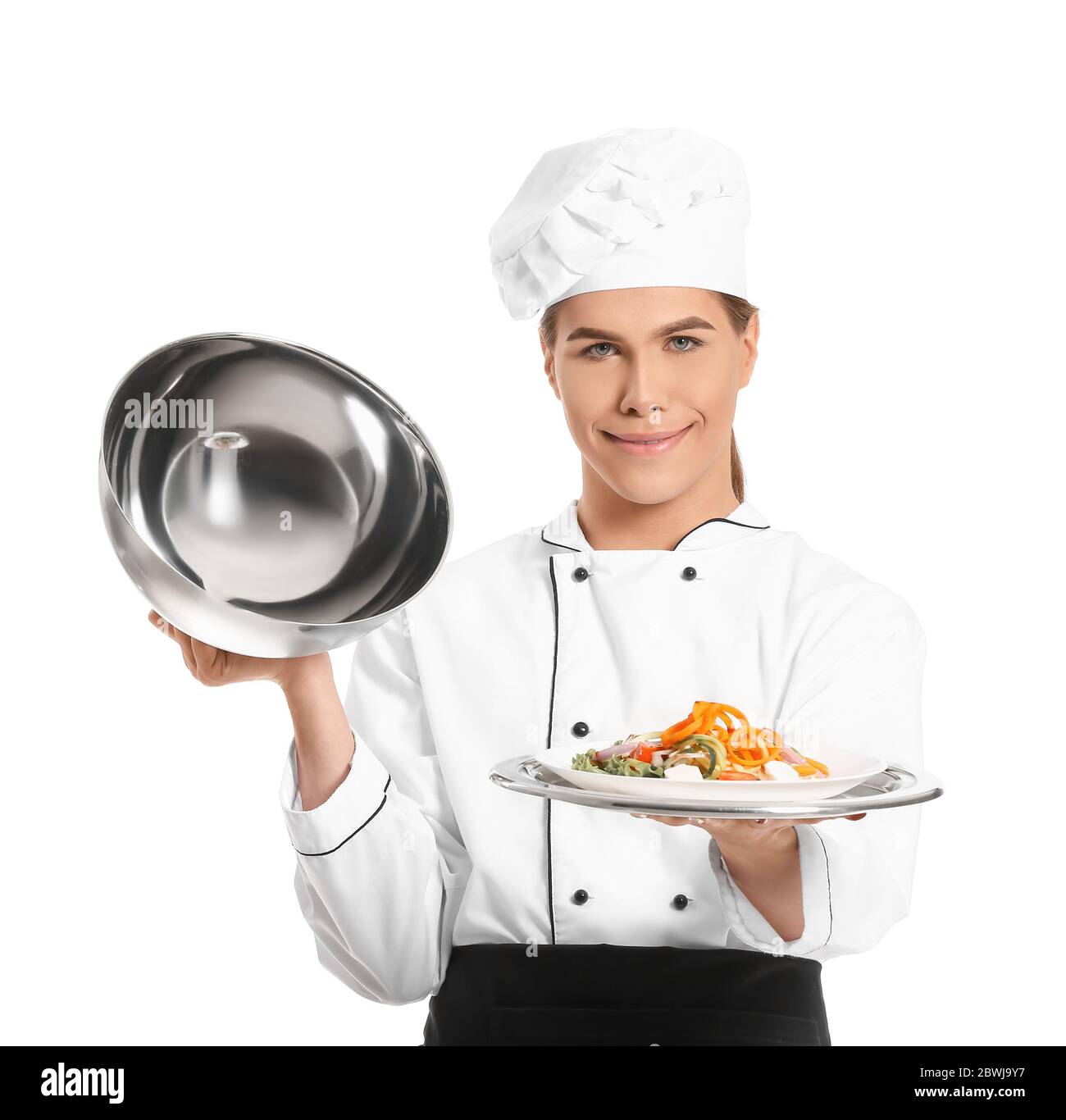 Transgender chef with salad on white background Stock Photo - Alamy