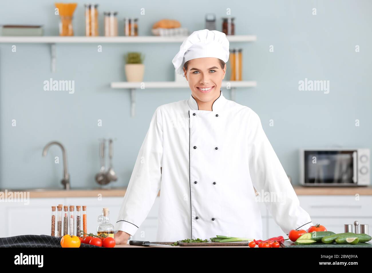 Transgender chef cooking in kitchen Stock Photo - Alamy