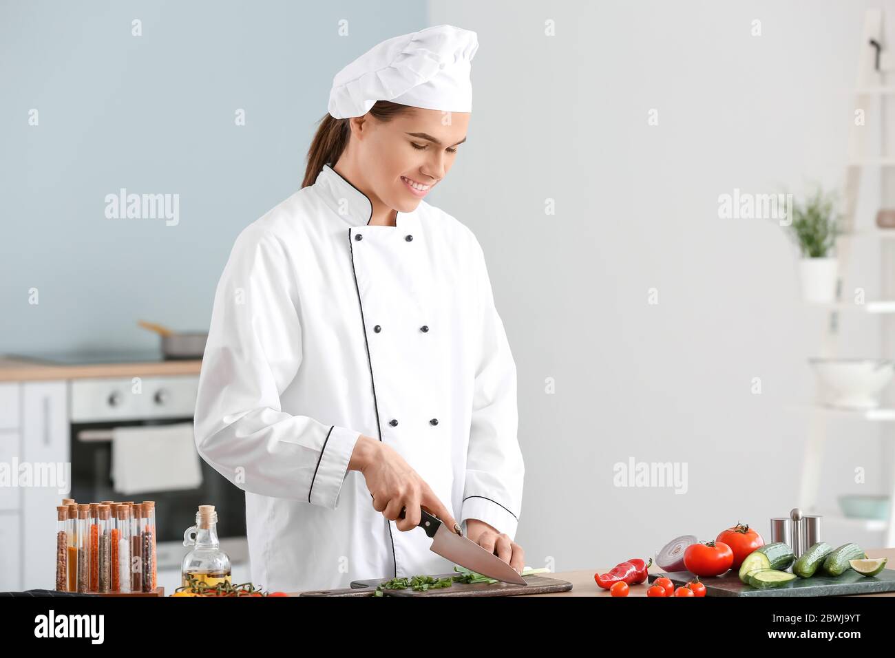 Transgender chef cooking in kitchen Stock Photo - Alamy