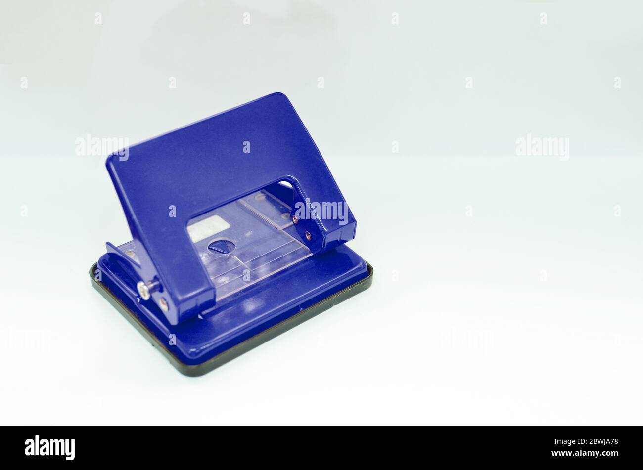 Paper clip hole punch hi-res stock photography and images - Alamy