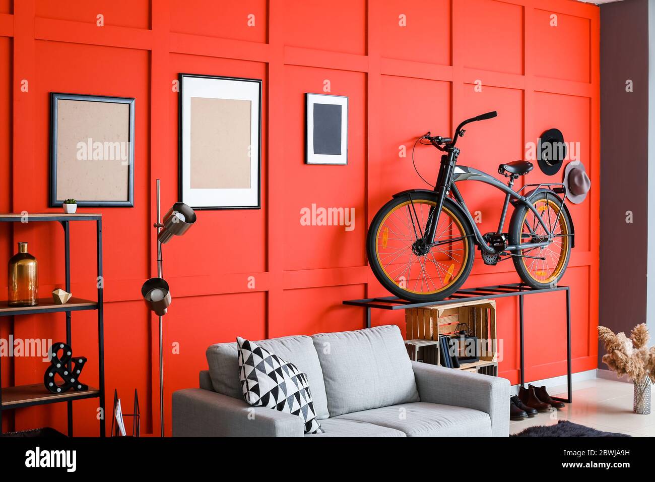 Interior of modern room with bicycle Stock Photo - Alamy