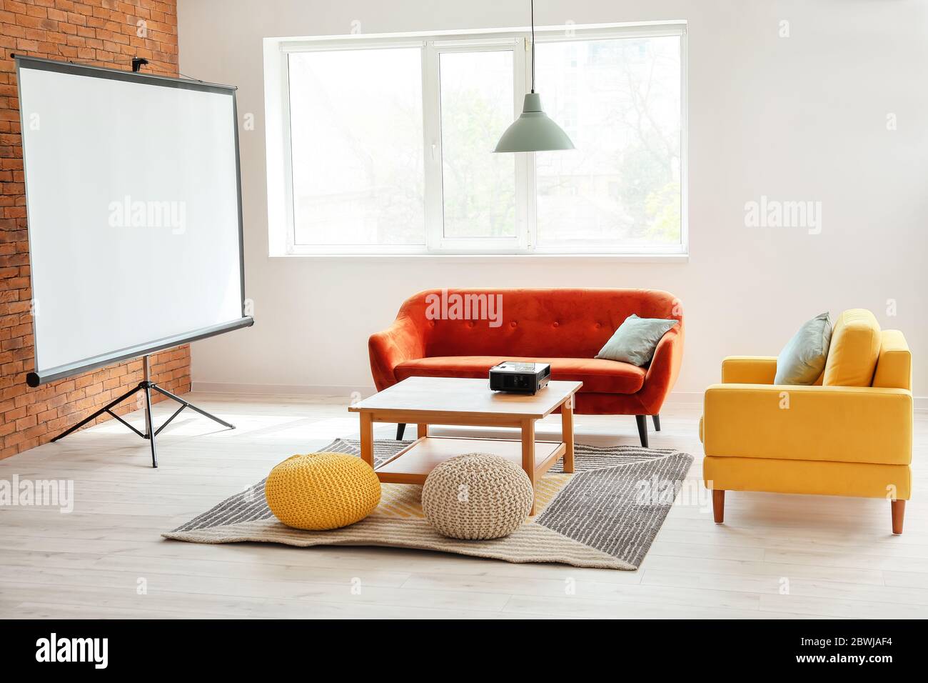Interior of room with video projector Stock Photo - Alamy