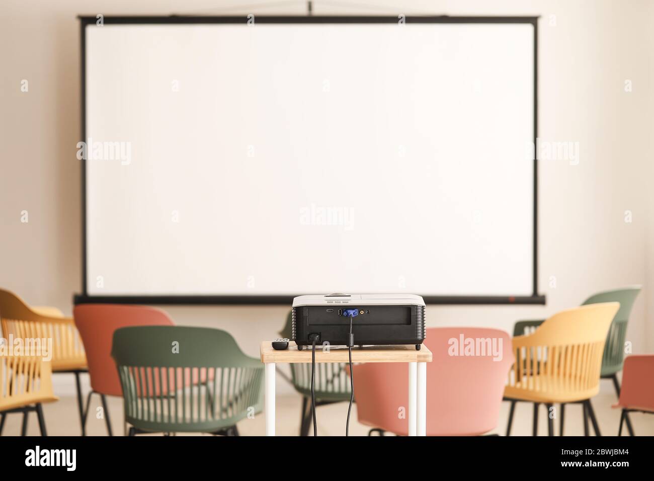 Interior of room with video projector Stock Photo - Alamy