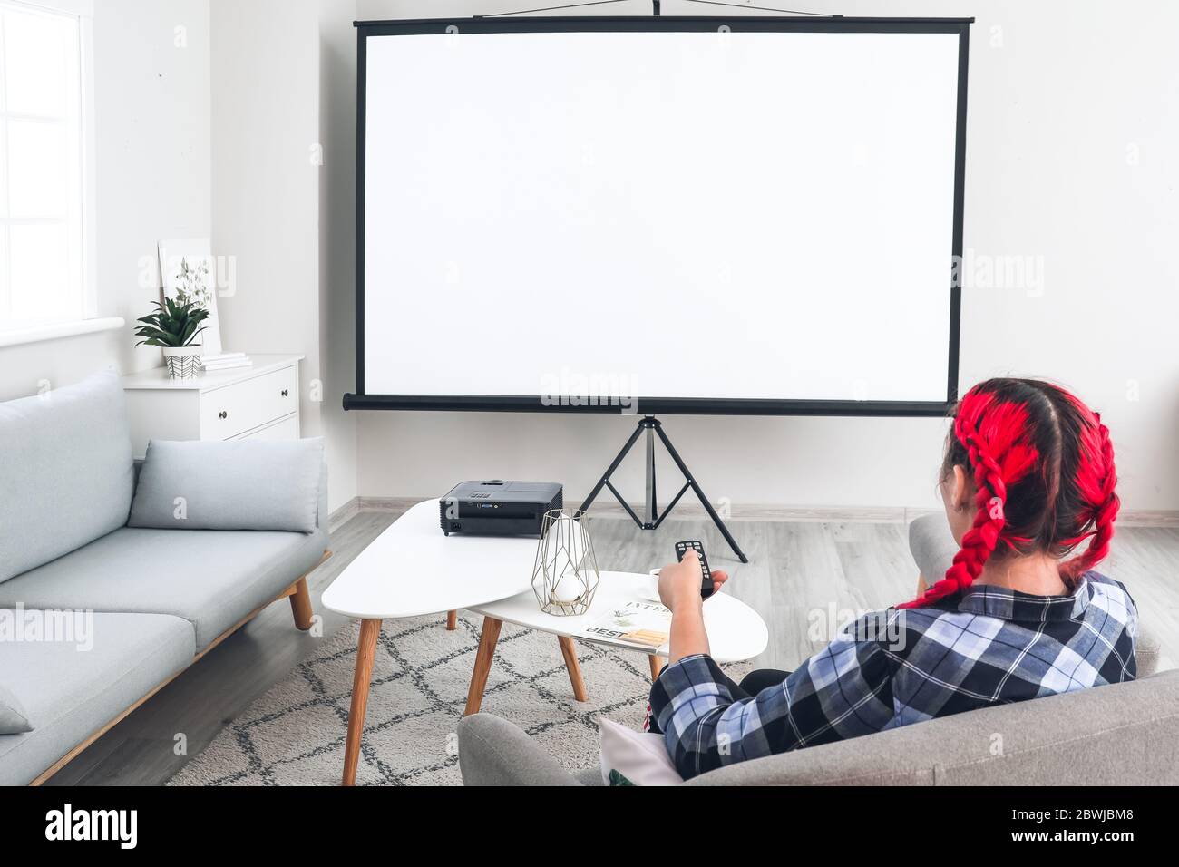 Film projector woman hi-res stock photography and images - Alamy