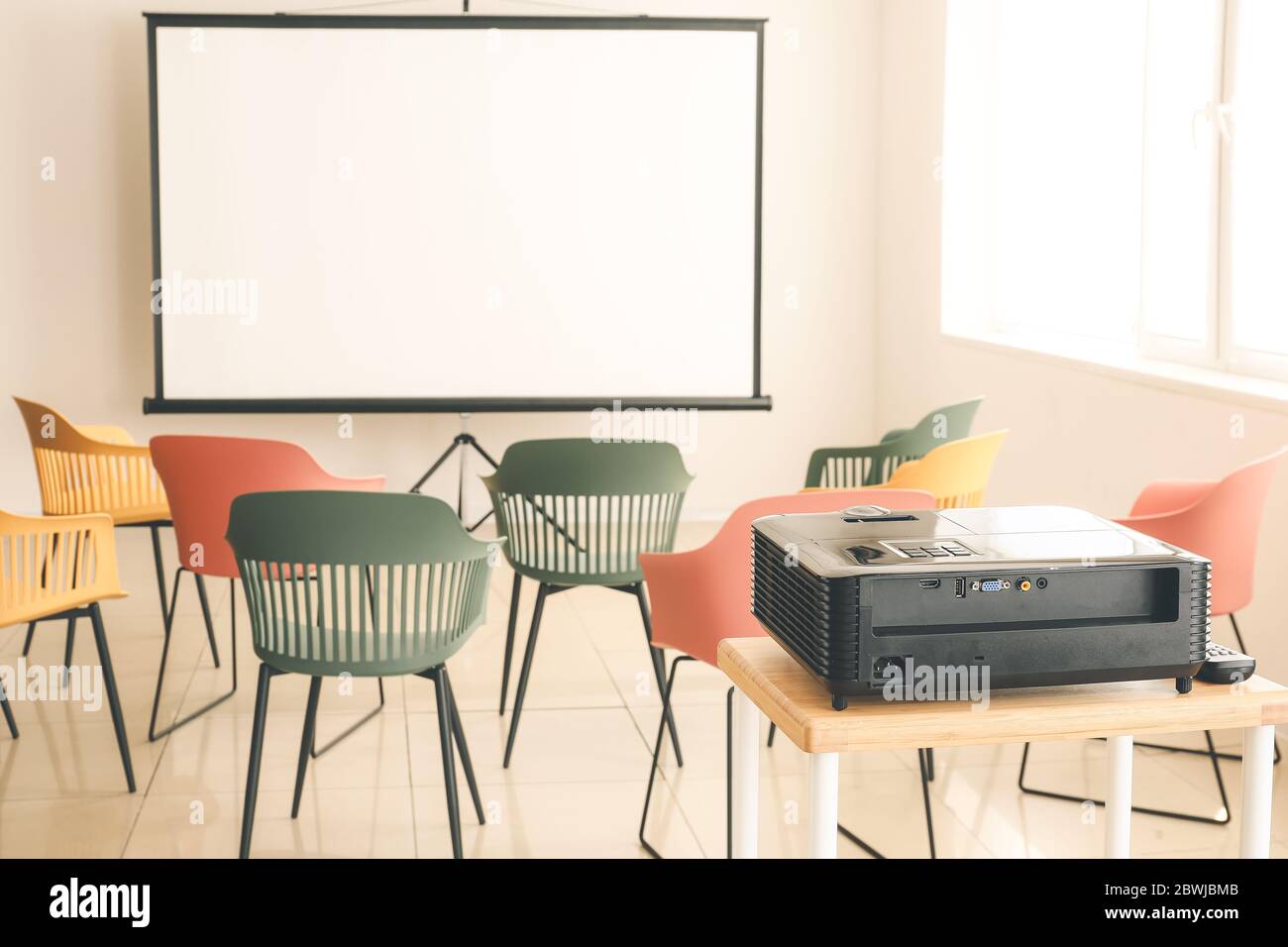 Interior of room with video projector Stock Photo - Alamy