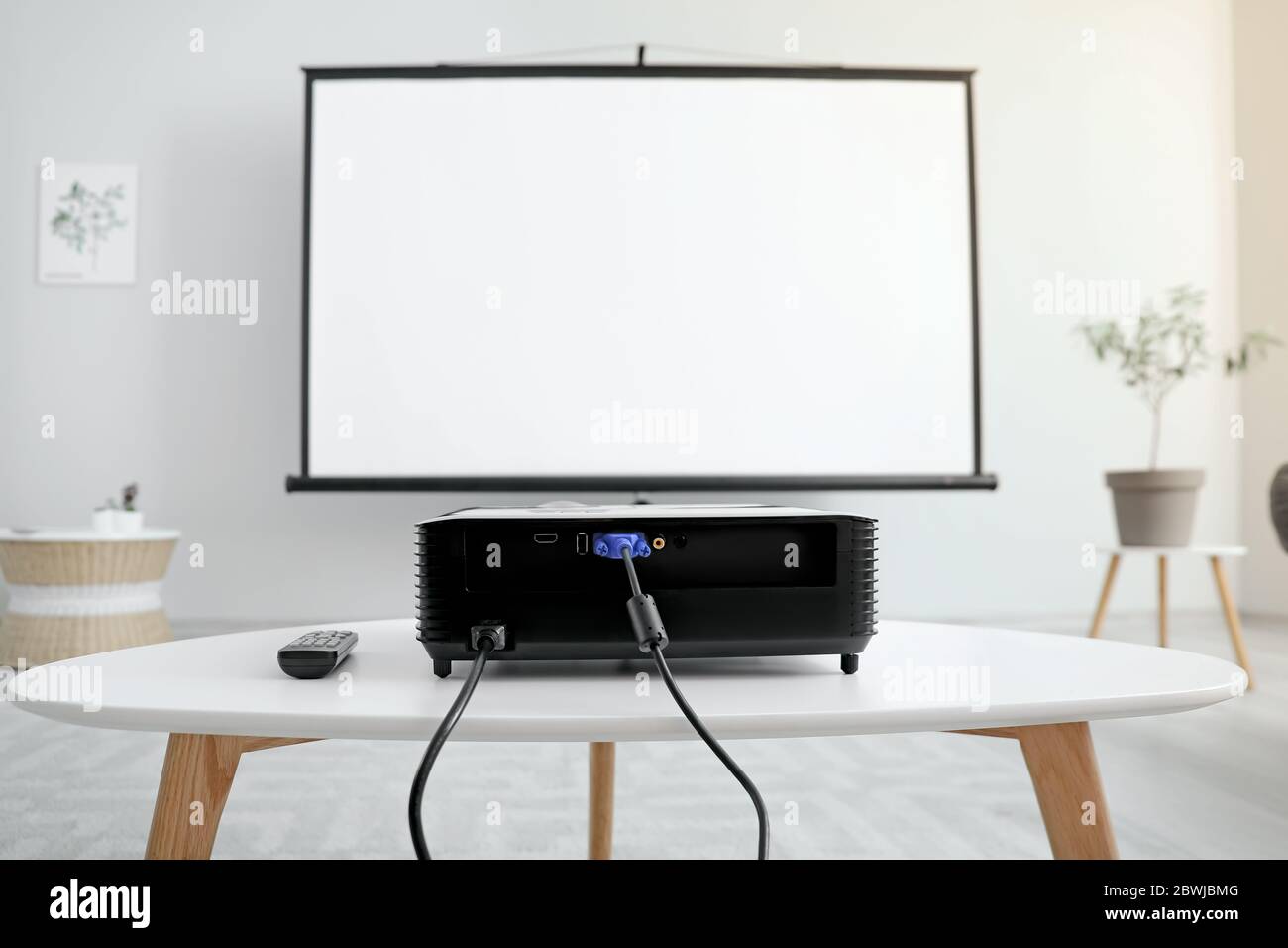 Modern video projector in room Stock Photo - Alamy