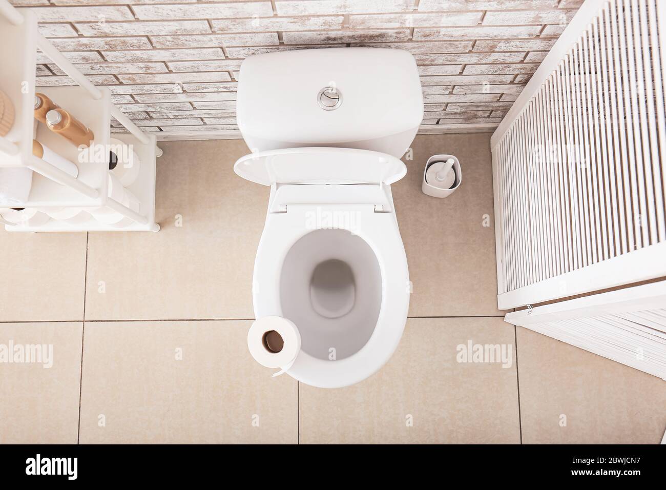 Interior of bathroom with toilet bowl, top view Stock Photo - Alamy