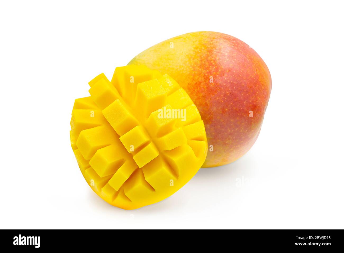 Whole ripe R2E2 mango and slice in cube shape so juicy and fresh on ...