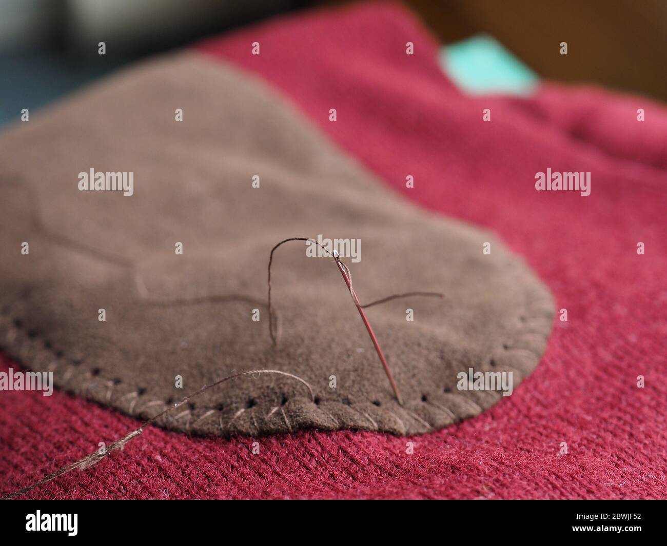 Patch sewing hi-res stock photography and images - Alamy