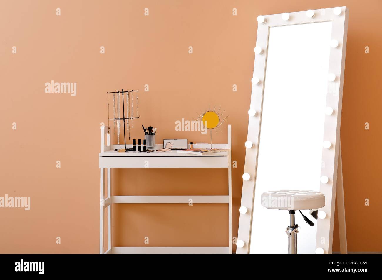 Mirror and makeup cosmetics in modern dressing room Stock Photo - Alamy
