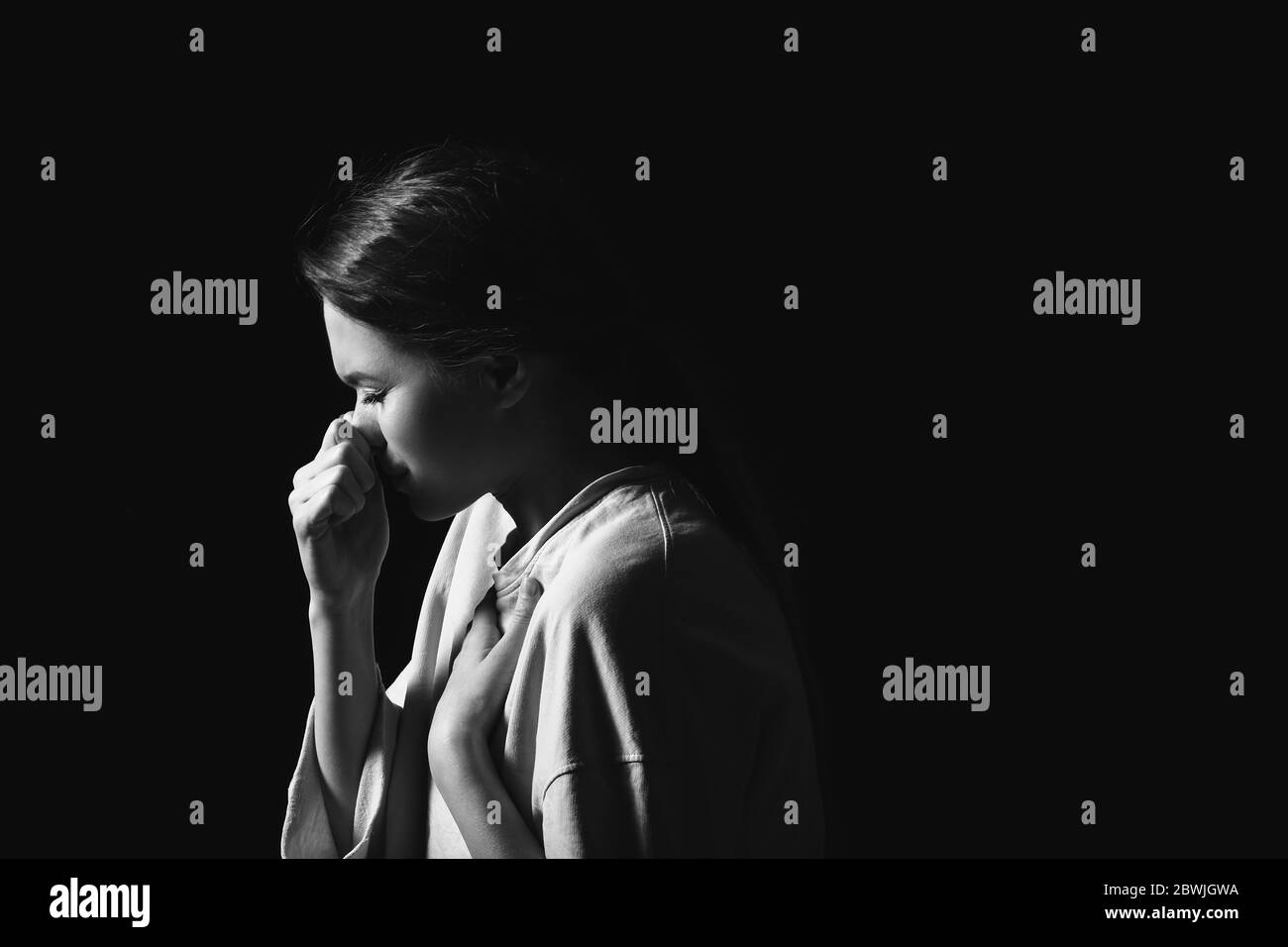 Coughing young woman on dark background. Concept of epidemic Stock ...