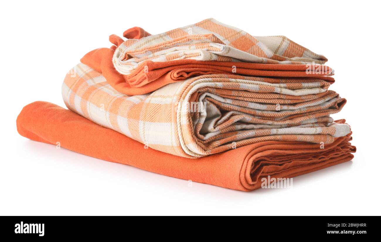 Stack of clean bed sheets on white background Stock Photo - Alamy