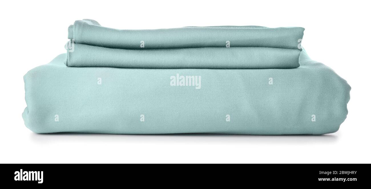 Stack of clean bed sheets on white background Stock Photo - Alamy