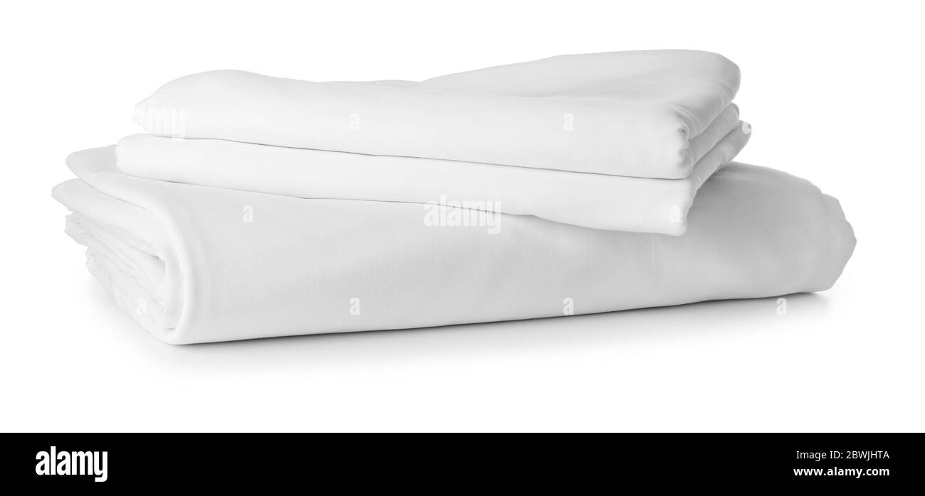 Stack of clean bed sheets on white background Stock Photo - Alamy