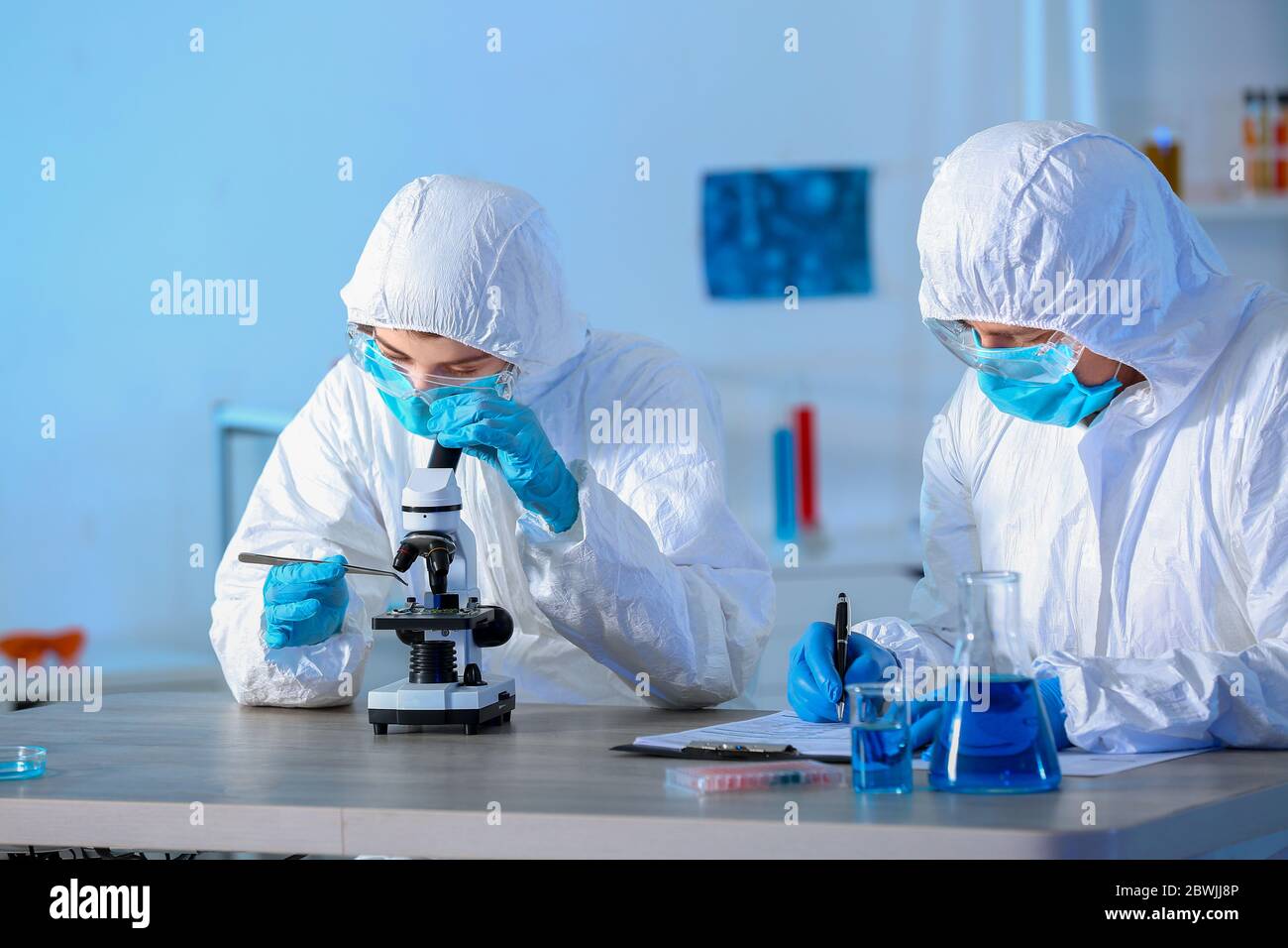 Scientists working in the laboratory hi-res stock photography and ...