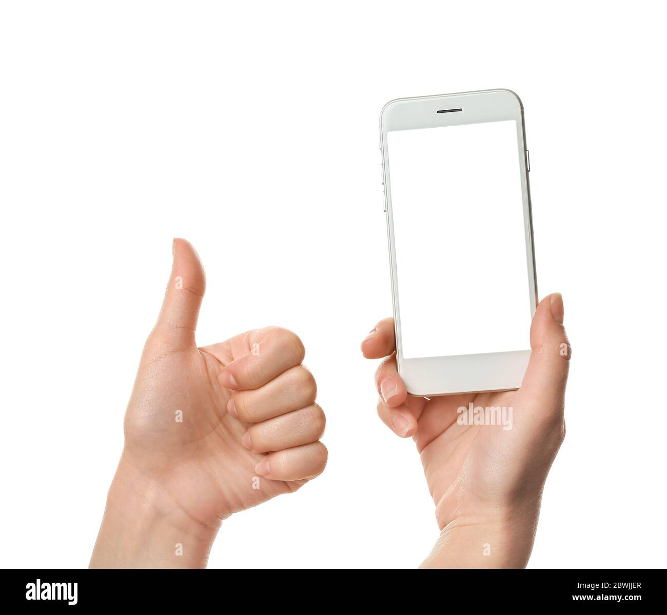 Female hands with mobile phone showing thumb-up gesture on white ...