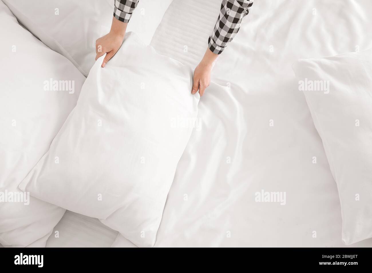 Household housewife making bed hi-res stock photography and images - Alamy