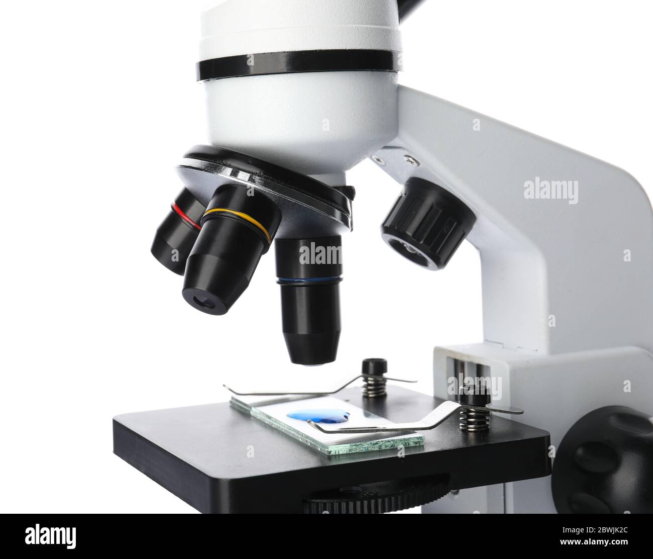 Modern microscope on white background Stock Photo - Alamy
