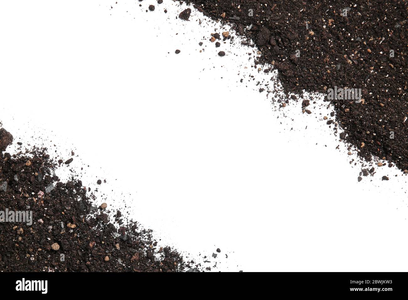 Scattered soil on white background Stock Photo - Alamy