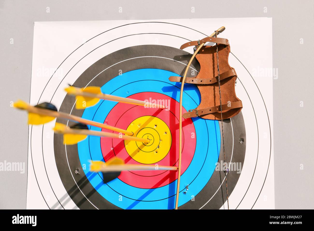 Target for archery with arrows, bow and protective gear outdoors Stock ...