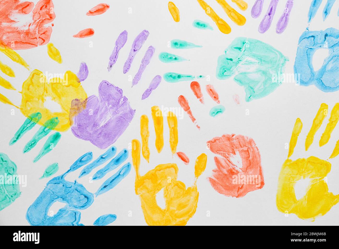 Colorful human palm prints on white background. Unity concept Stock ...