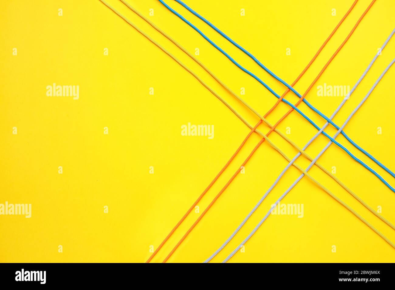 Threads on color background. Unity concept Stock Photo - Alamy